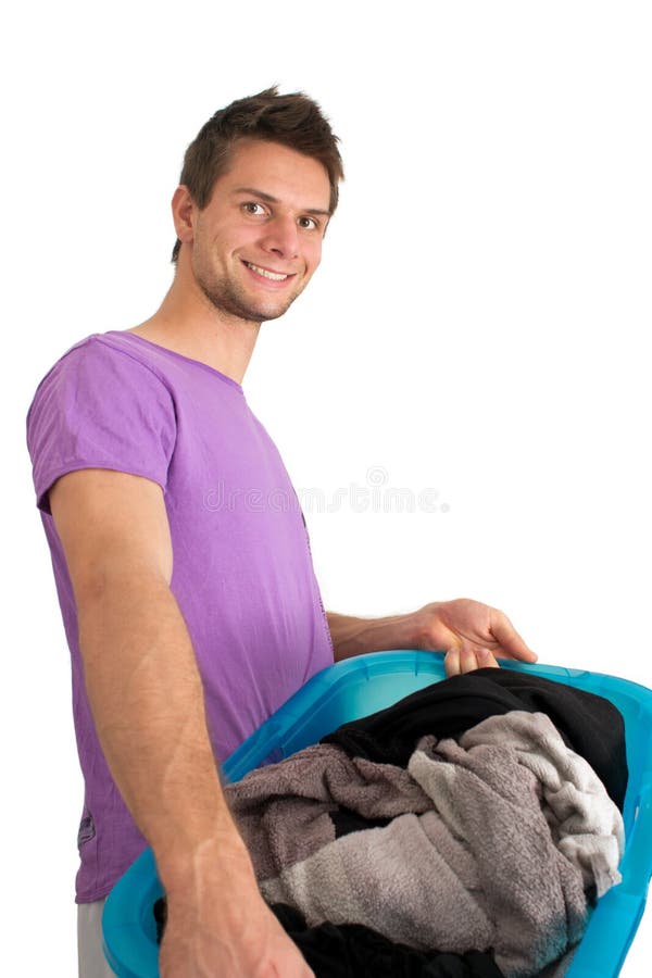 Young Man Doing the Laundry Stock Image - Image of blue, face: 22034797