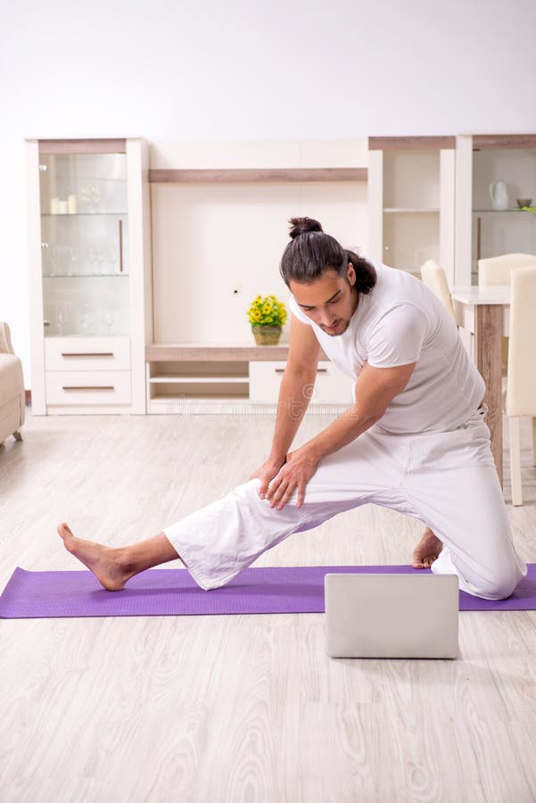 Young Man Doing Physical Exercises at Home Stock Image - Image of ...