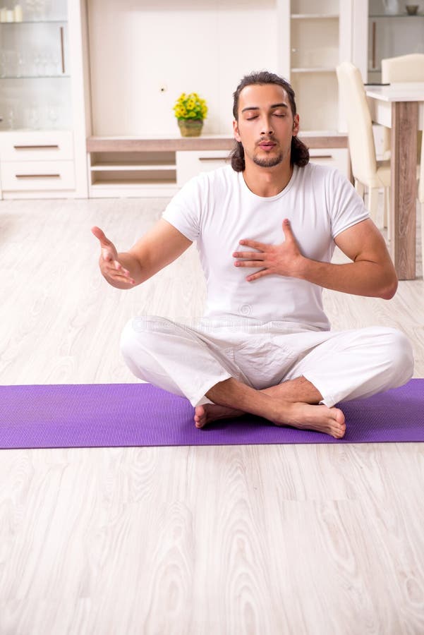 Young Man Doing Physical Exercises at Home Stock Image - Image of home ...