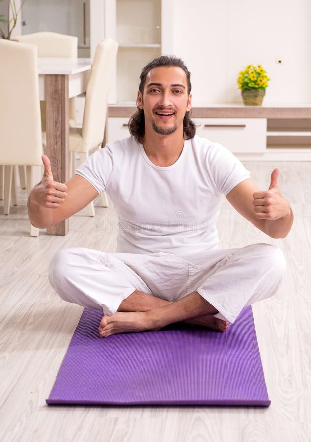 Young Man Doing Physical Exercises at Home Stock Image - Image of ...