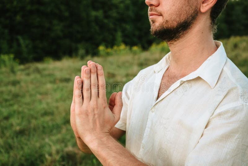 Young Man Doing Yoga in Nature, Folded Hands in Namaste 1 Stock Photo ...