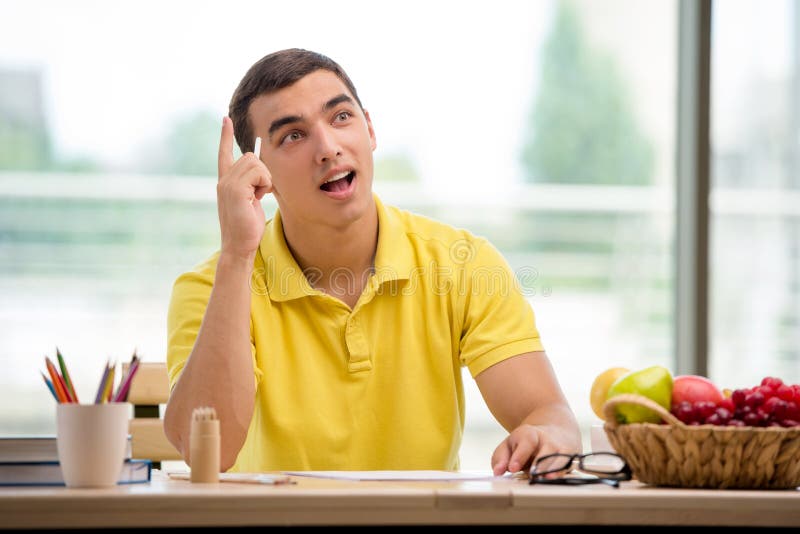 The Young Man Drawing Pictures in Studio Stock Image - Image of ...