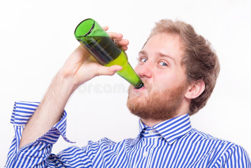 Young Man Drinking a Bottle of Beer Stock Image - Image of beer ...