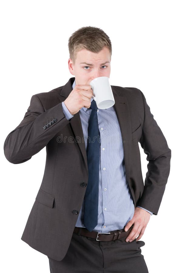 Young Man is Drinking a Cup of Coffee Stock Photo - Image of male, grey ...
