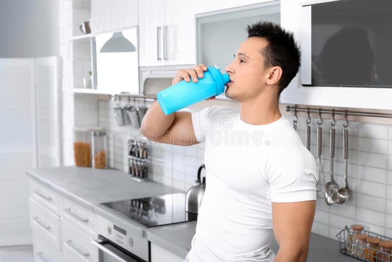 Young Man Drinking Protein Shake Stock Image - Image of copy, drinking ...