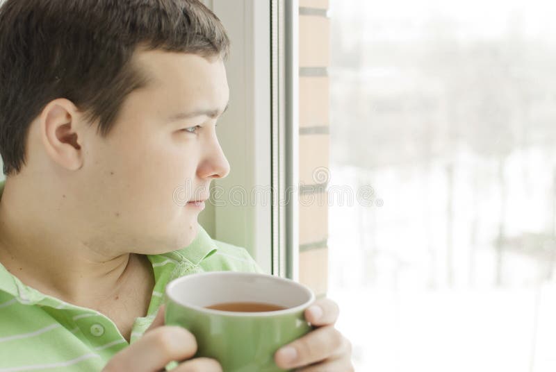 Young man drinking tea stock image. Image of beautiful - 18008237 Young man drinking tea stock image. Image of beautiful - 18008237