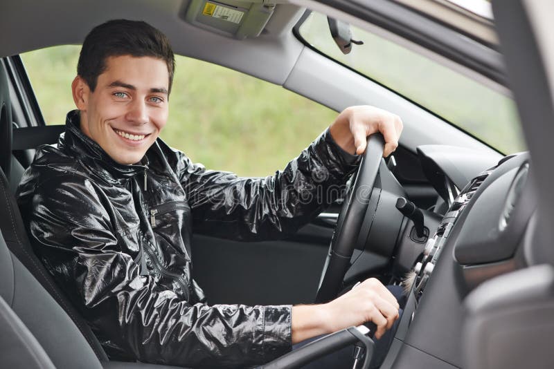 Young man driver in a car stock photo. Image of hair - 35359422