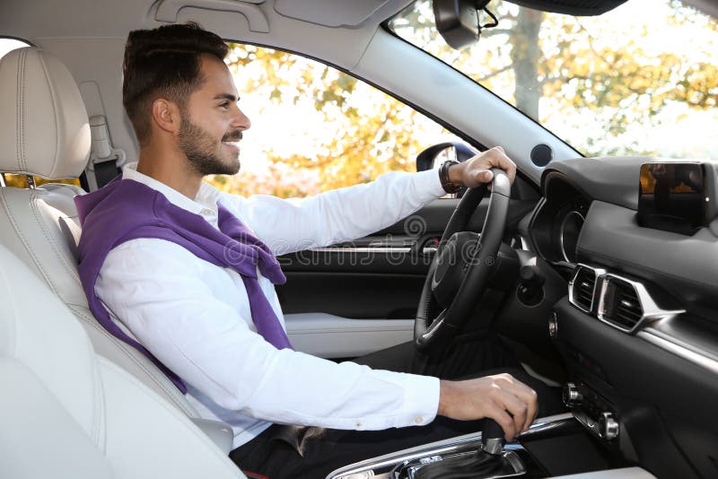 Young man in driver`s seat stock image. Image of driver - 130798489