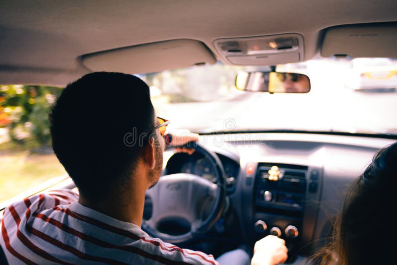 Young Man Driving Around Town Stock Image - Image of automobile, group ...