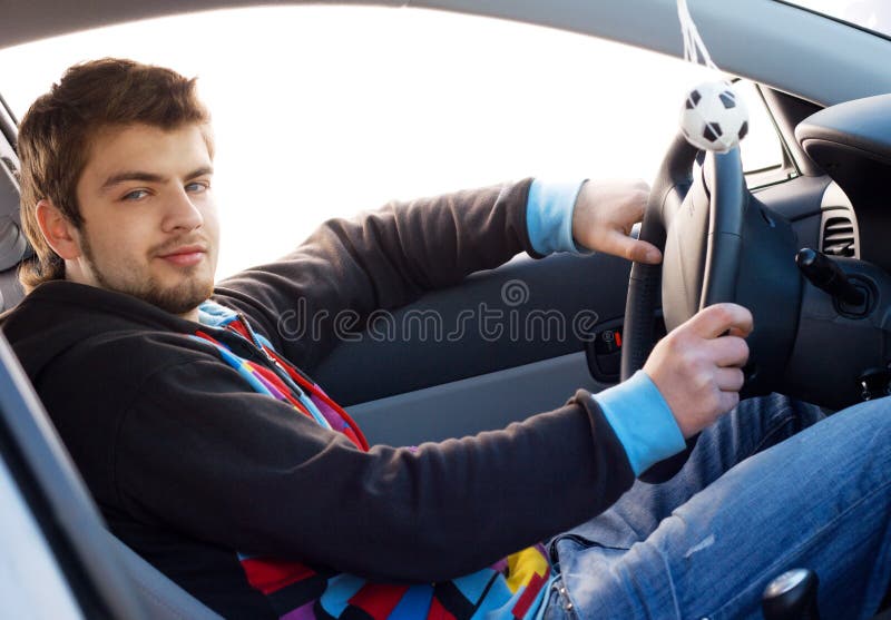 Young man driving a car stock photo. Image of happiness - 10975466