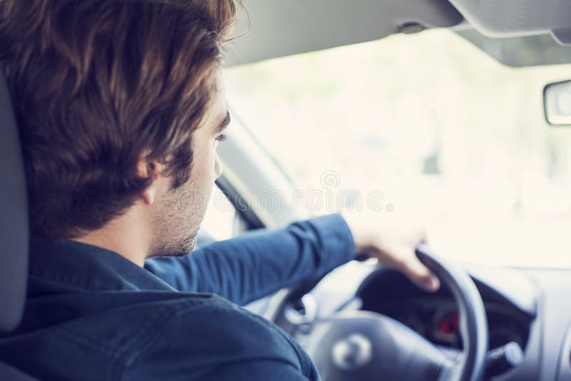 Young man driving car stock photo. Image of traffic, male - 60844638