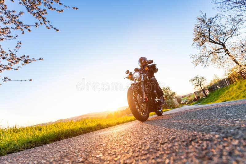 Young man driving chopper stock image. Image of evening - 70444031