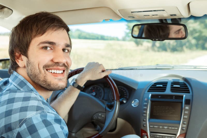 Young man driving his car stock photo. Image of caucasian - 60714618