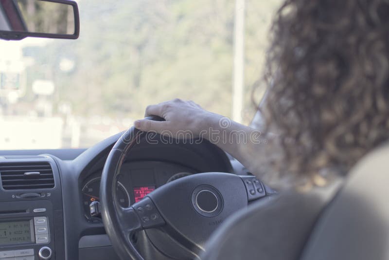 Young Man Driving - Left Hand Traffic Stock Image - Image of steering ...