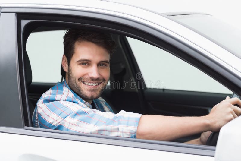 Young Man Driving and Smiling Stock Photo - Image of portrait, adult ...