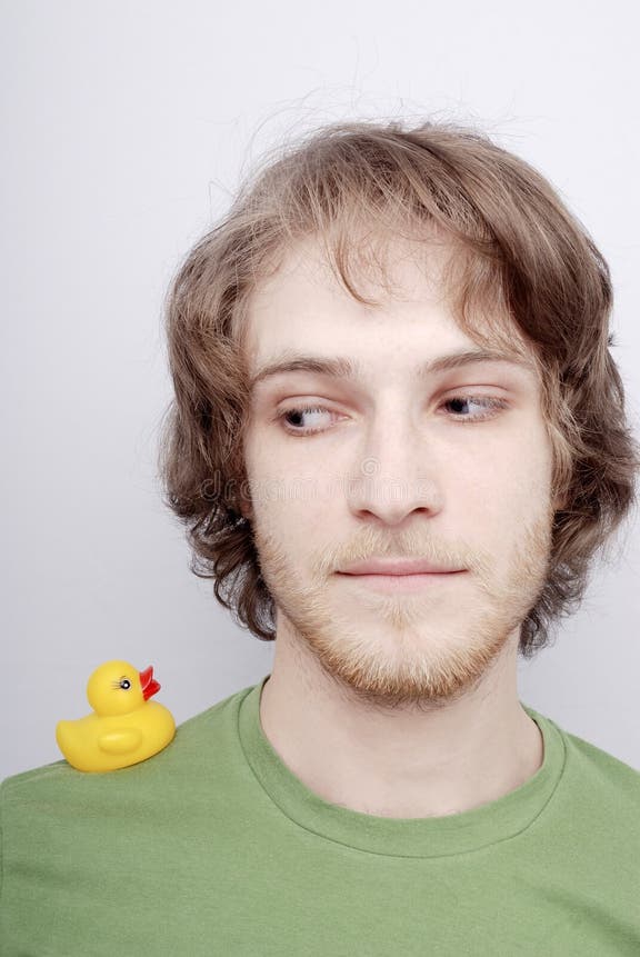Young man with a duck stock image. Image of face, surprised - 7970647