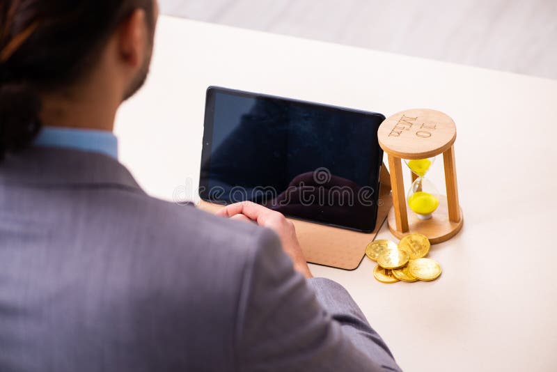 Young Man Earning Money Via Internet in Time Management Concept Stock ...