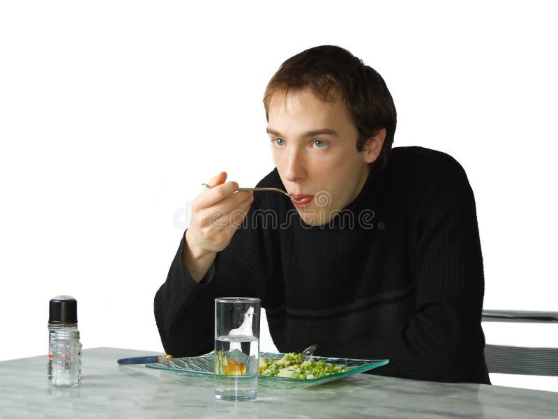 Young man eating stock photo. Image of calamari, isolated - 11272462