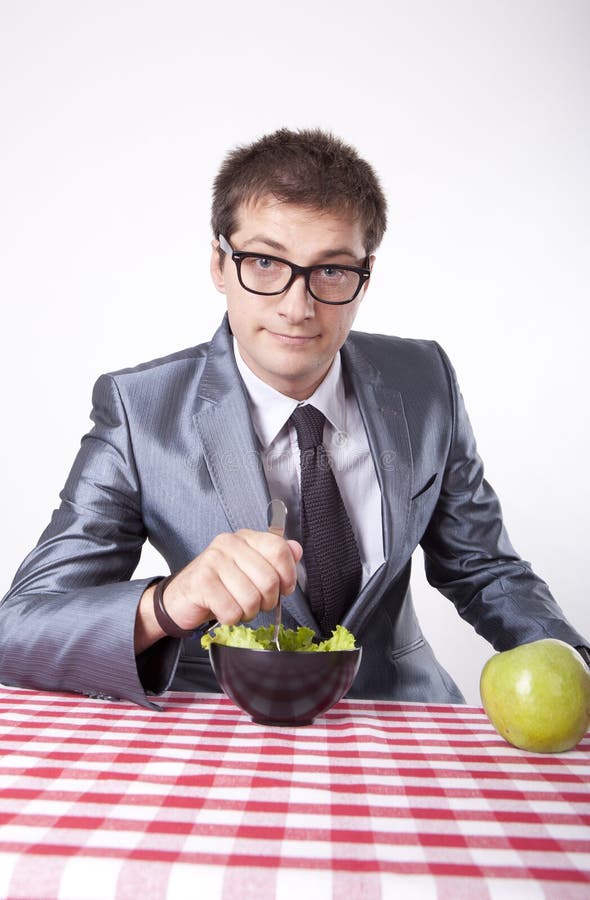 Young man eating stock image. Image of fresh, gourmet - 26256335