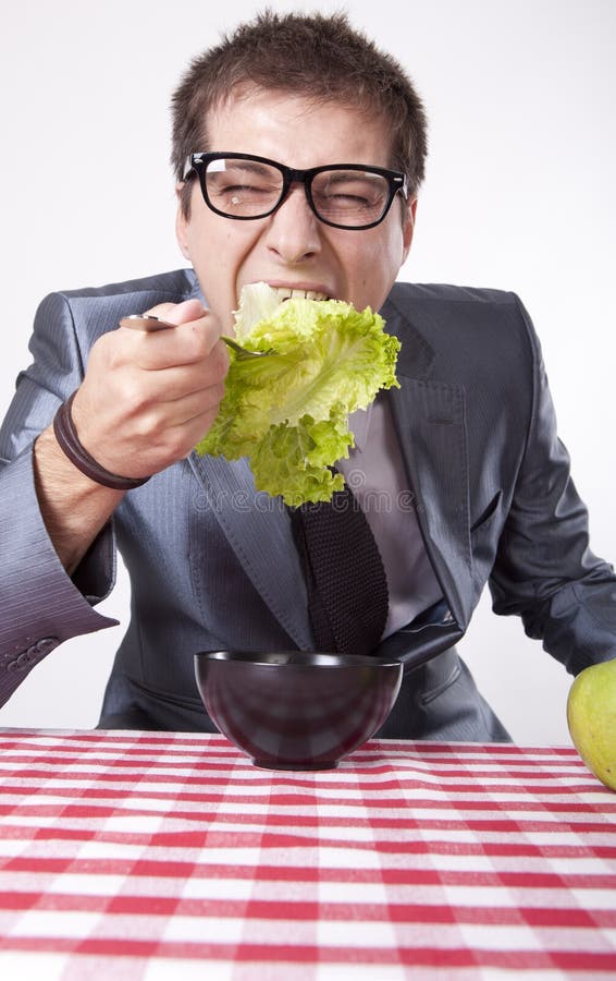 Man Holding and Eating Lettuce Stock Photo - Image of calories ...