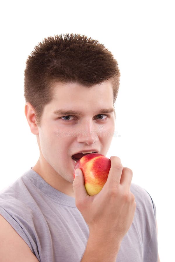 Teen boy holding apple. stock image. Image of caucasian - 2044215