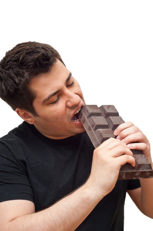 Young Man Eating Big Chocolate Stock Photo - Image of food, masculine ...