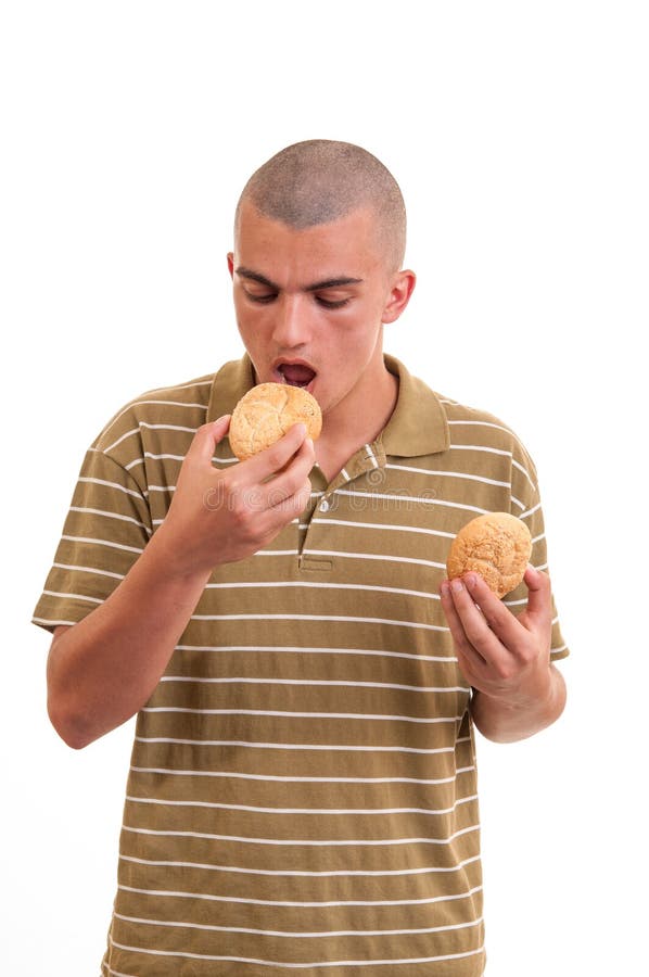 Young Man Eating Buns with Sesame Stock Image - Image of fresh, cuisine ...