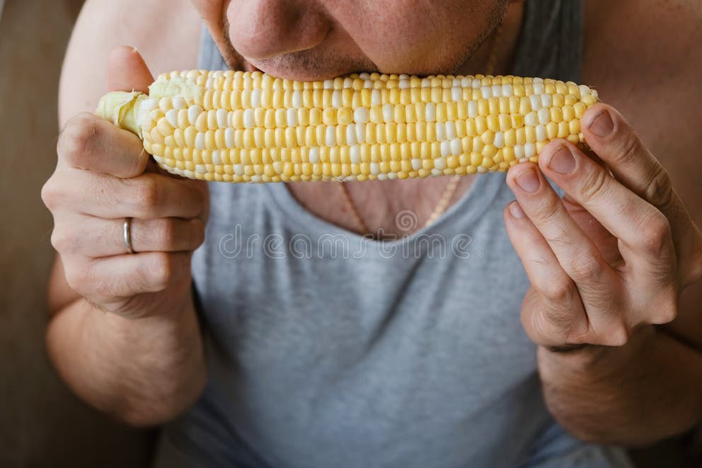 Young Man Eating Corn Close-up of an Unrecognizable Stock Photo - Image ...
