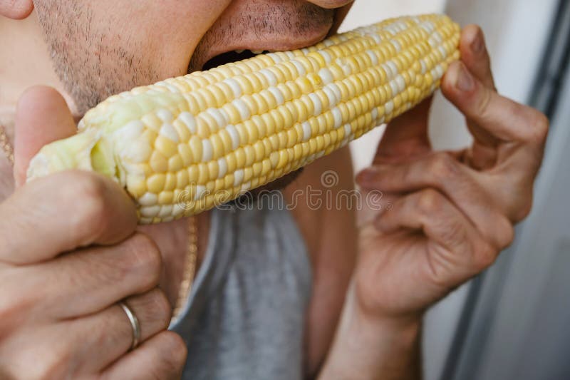 Young Man Eating Corn Close-up of an Unrecognizable Stock Image - Image ...