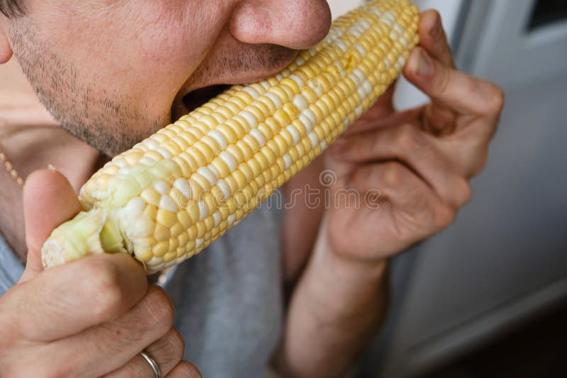 Young Man Eating Corn Close-up of an Unrecognizable Stock Image - Image ...