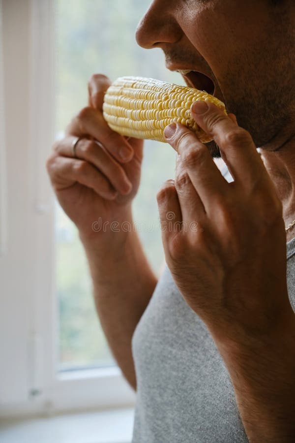 Young Man Eating Corn Close-up of an Unrecognizable Stock Photo - Image ...