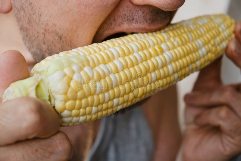 Young Man Eating Corn Close-up of an Unrecognizable Stock Photo - Image ...