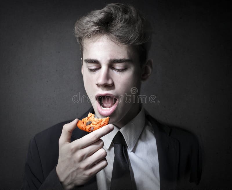 Young man eating stock photo. Image of food, pause, cauasian - 30758600