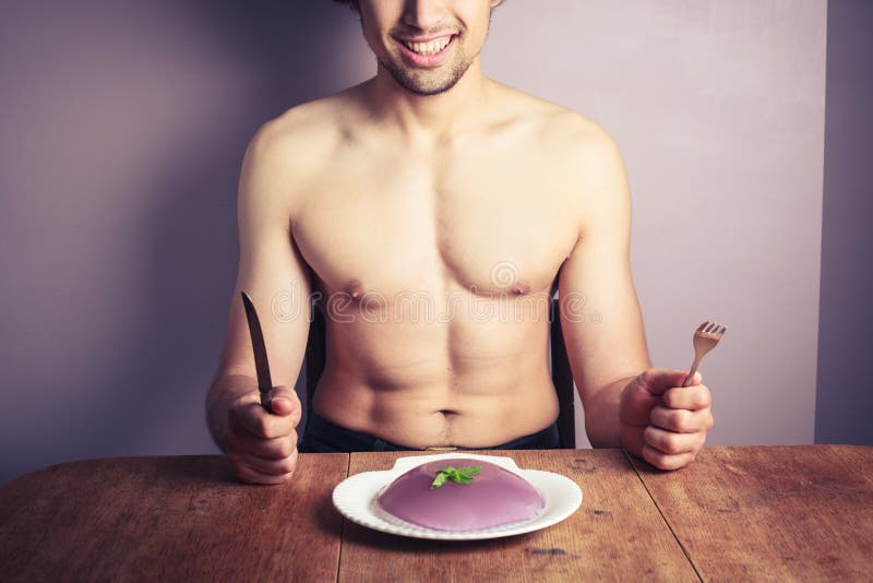 Young Man Eating Purple Pudding Stock Image - Image of enjoying ...