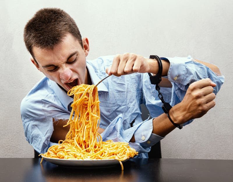 Young Man Eating Spaghetti Handcuffed Stock Photo - Image of ...
