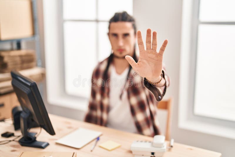 Young Man Ecommerce Business Worker Doing Stop Gesture with Hand at ...