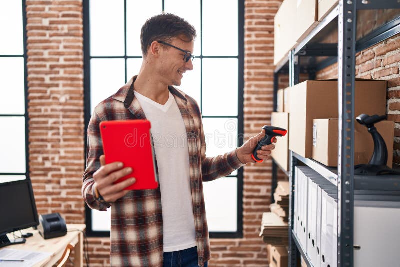 Young Man Ecommerce Business Worker Scanning Package Using Touchpad at ...