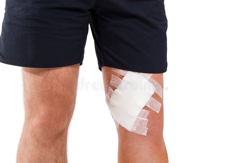 Young Man with Elastic Bandage on Knee, Isolated on White. Knee Surgery ...