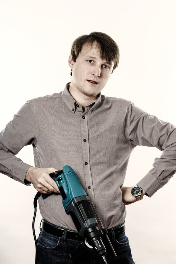 Young Man with Electric Drilling Machine Isolated on White Stock Image ...