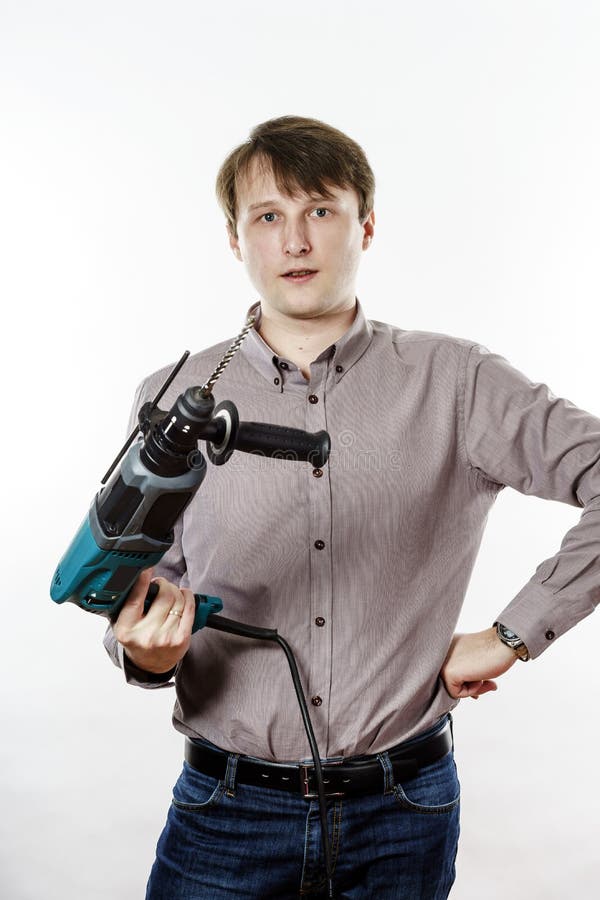 Young Man with Electric Drilling Machine Isolated on White Stock Photo ...