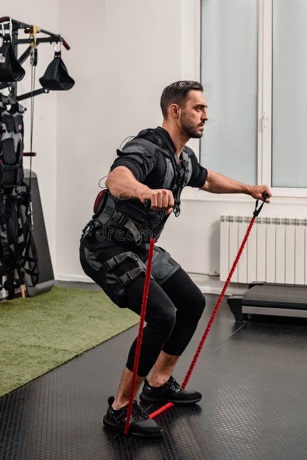 EMS Sportsman with Expander Stock Photo - Image of electro, costume ...