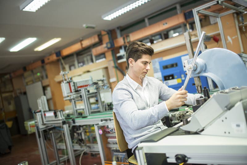 Young Man in Electronics Workshop Stock Photo - Image of young ...