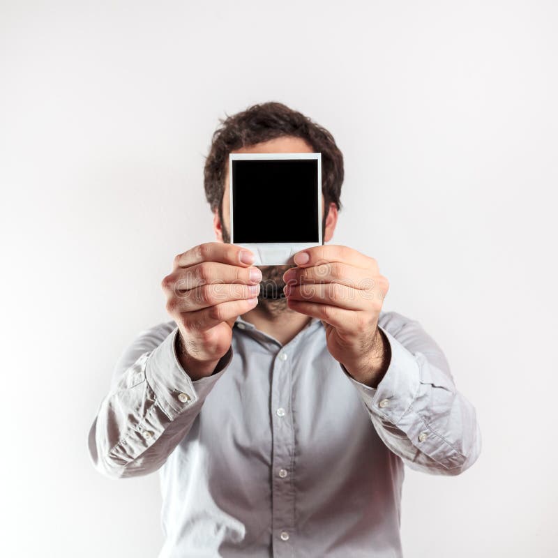 Young Man with Empty Photo Frame I Over the Face Stock Image - Image of ...