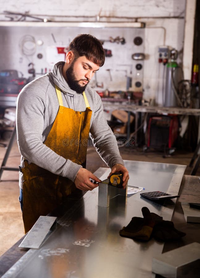Young Man Engineer Calculation Size of Material Stock Photo - Image of ...
