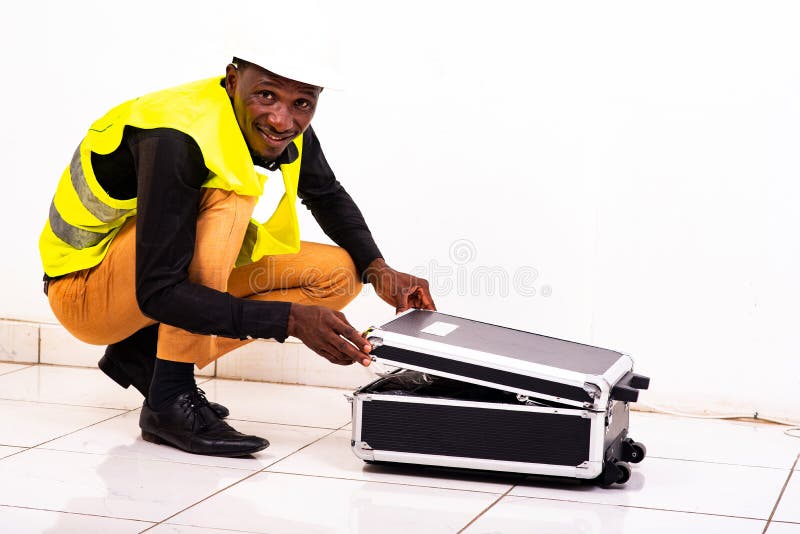 Young Man Engineer Opening a Toolbox Smiling Stock Image - Image of ...
