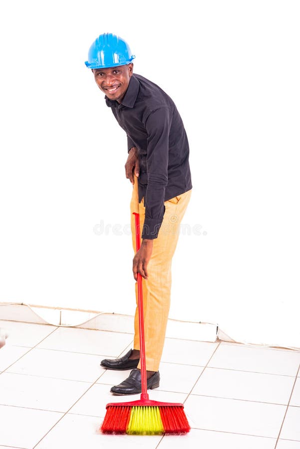 Young Man Engineer Sweeps the Desk Smiling Stock Photo - Image of face ...