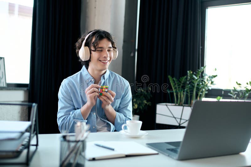 Young Man Enjoying a Creative Break Stock Image - Image of personal ...