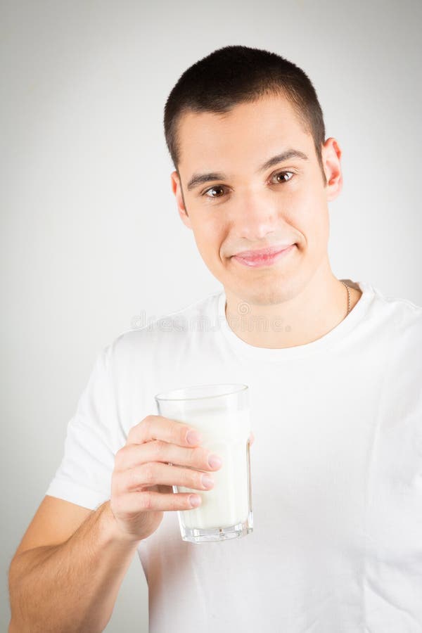 Young Man Enjoying a Glass of Milk Stock Photo - Image of person, white ...