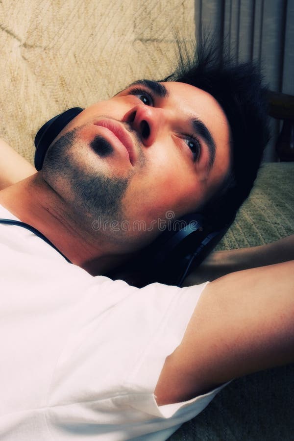 Young Man Enjoying Music stock photo. Image of casual - 7436996