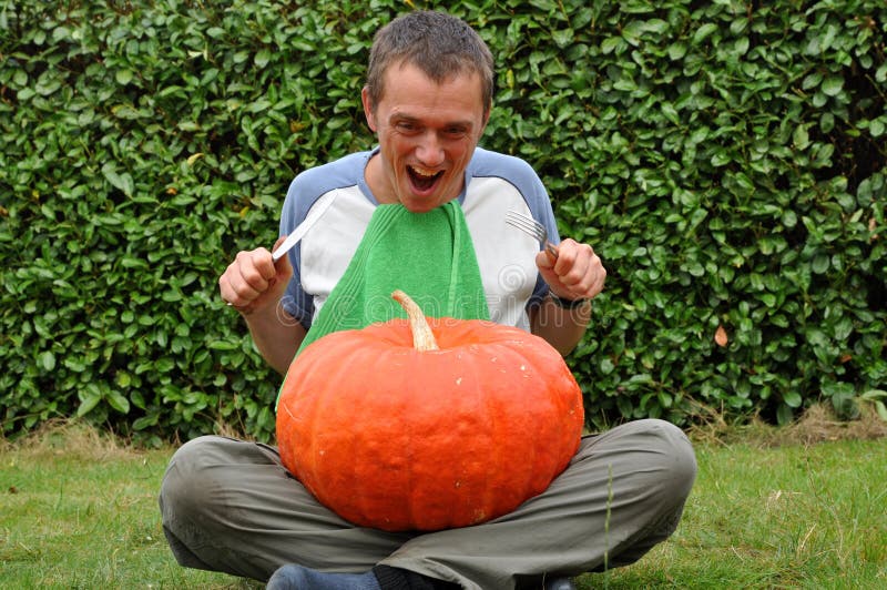 Young Man Eating His Huge Pumpkin Stock Photo - Image of caucasian ...